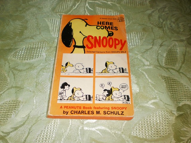 Here comes Snoopy by Charles M. Schulz