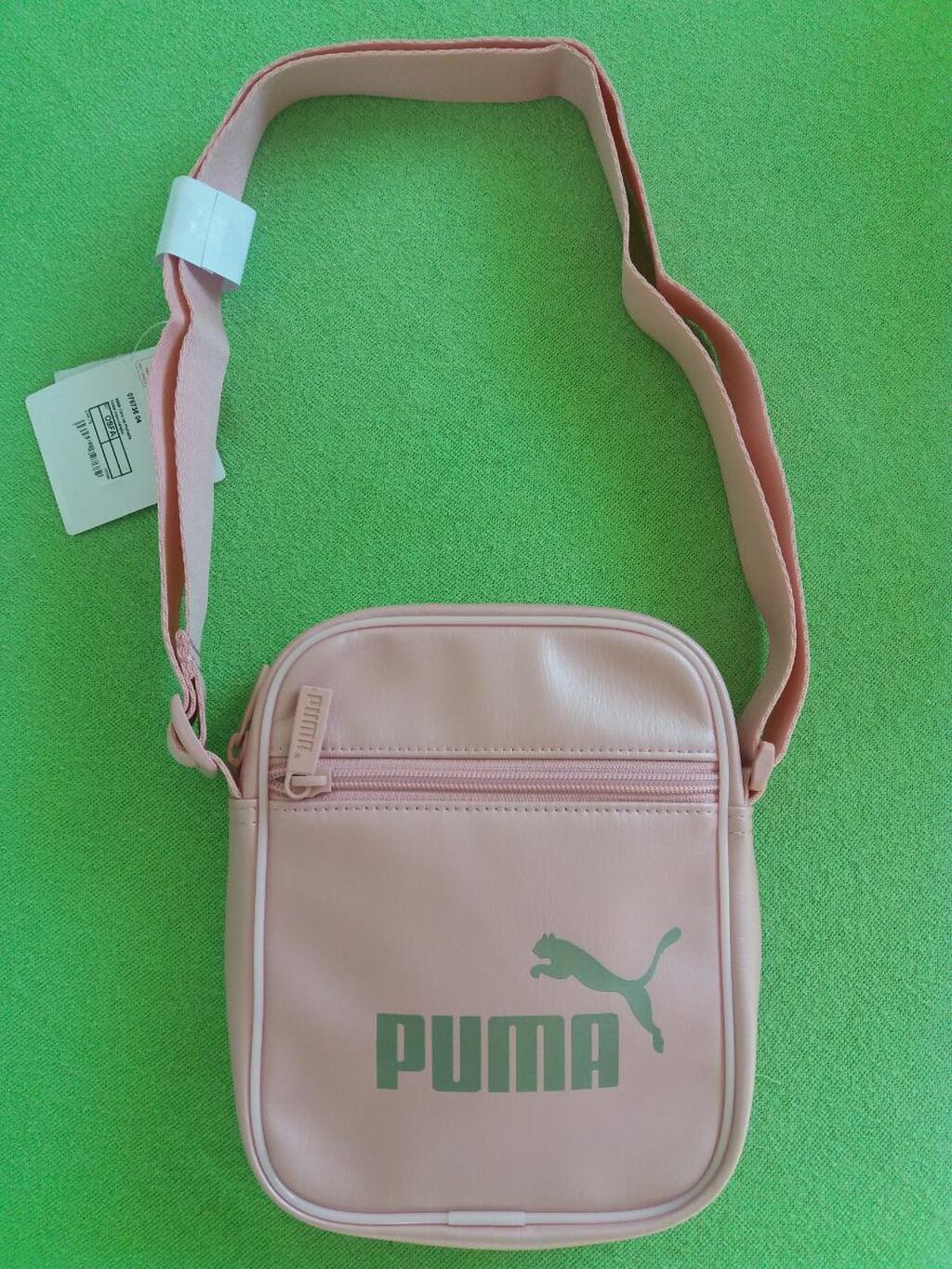 Puma torbica nova original. Roze boja. 1500din. 061/