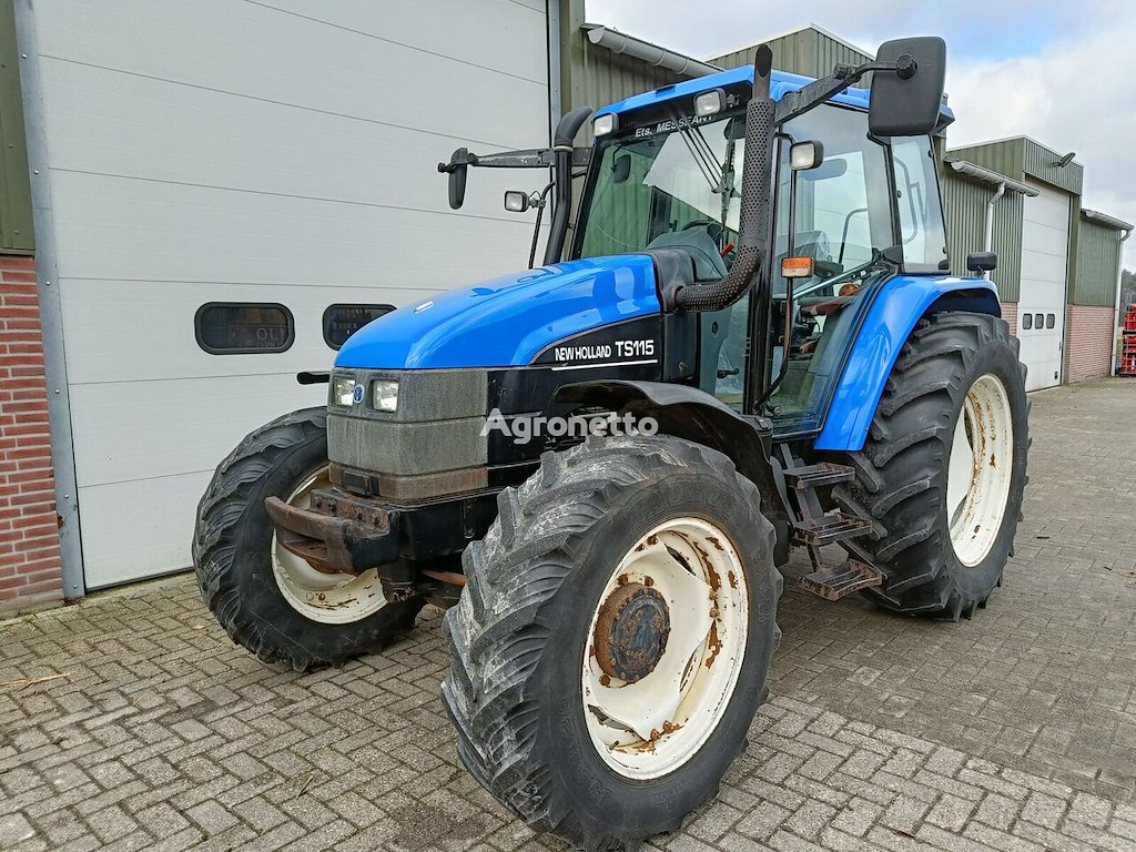 New Holland TS115 traktor točkaš