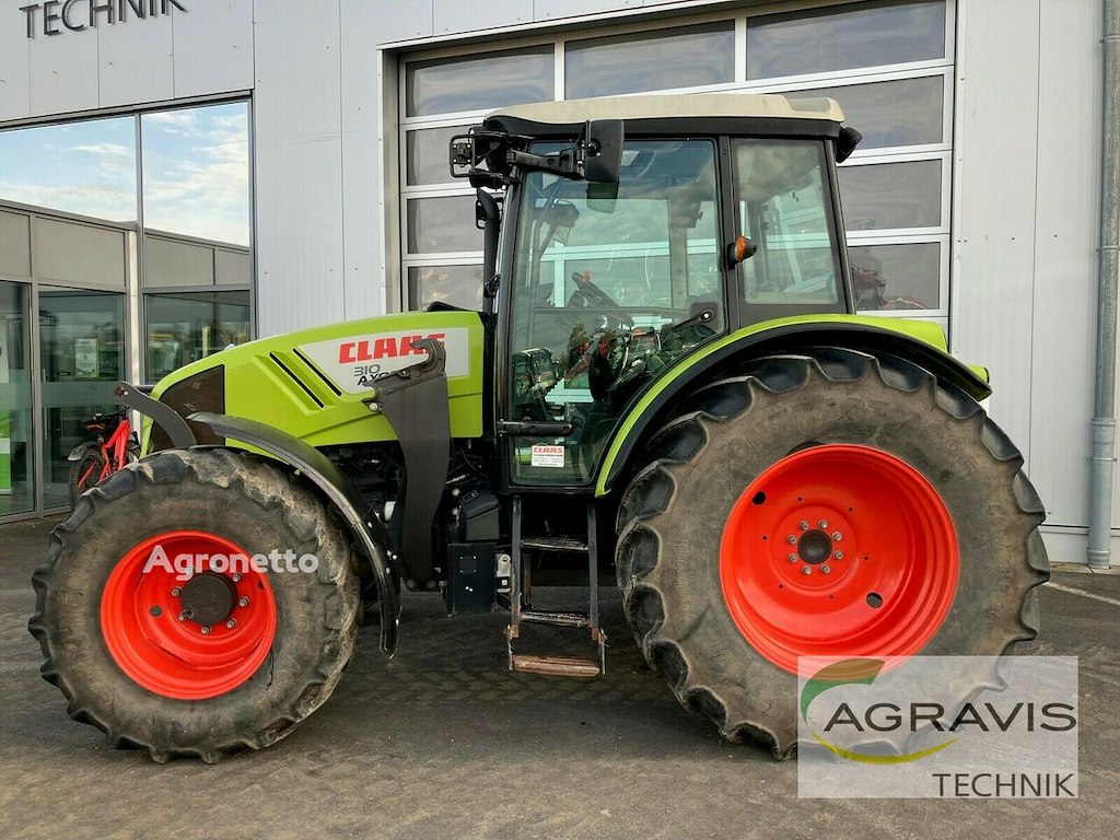 Claas Axos 310 C traktor točkaš