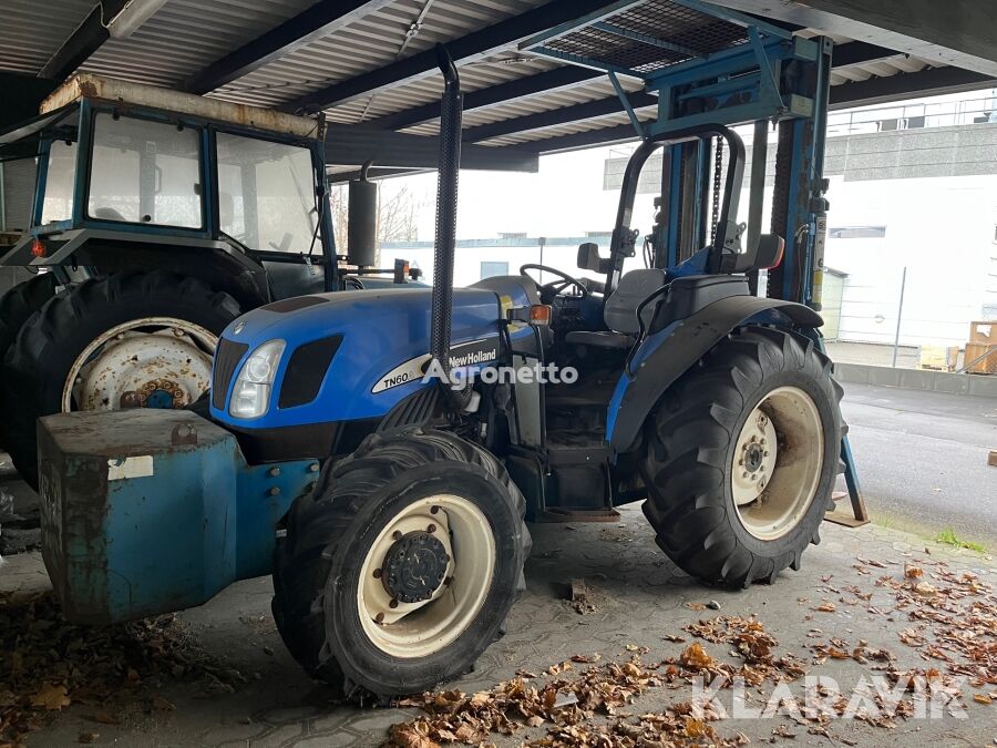 Prodaje se New Holland TN60A mini traktor na aukciji