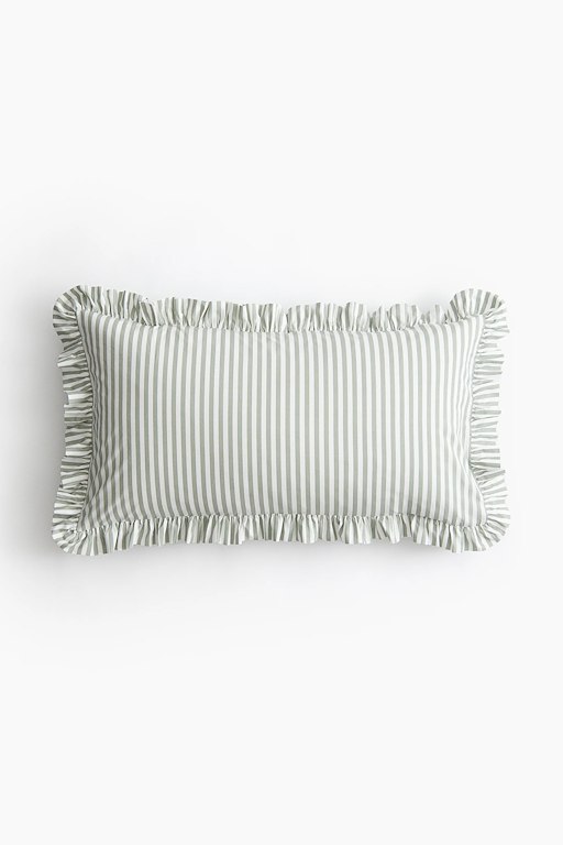 Frill-trimmed cotton cushion cover