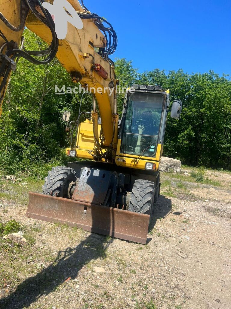 Komatsu 148- LC8 bager točkaš