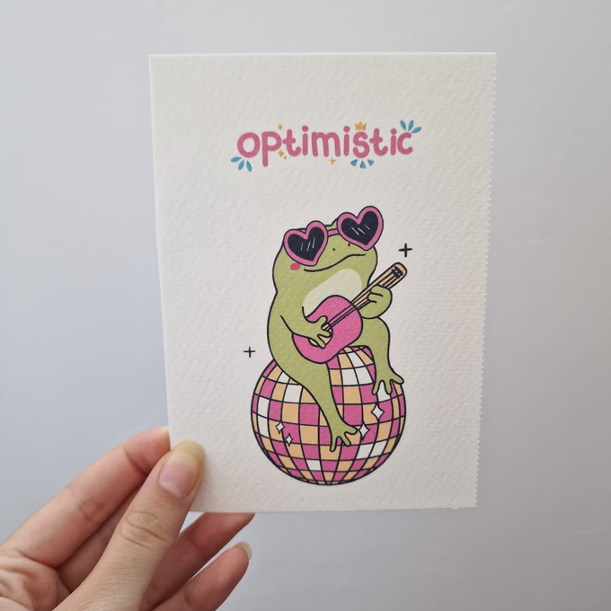 Art kartica Optimistic sa žabom i gitarom