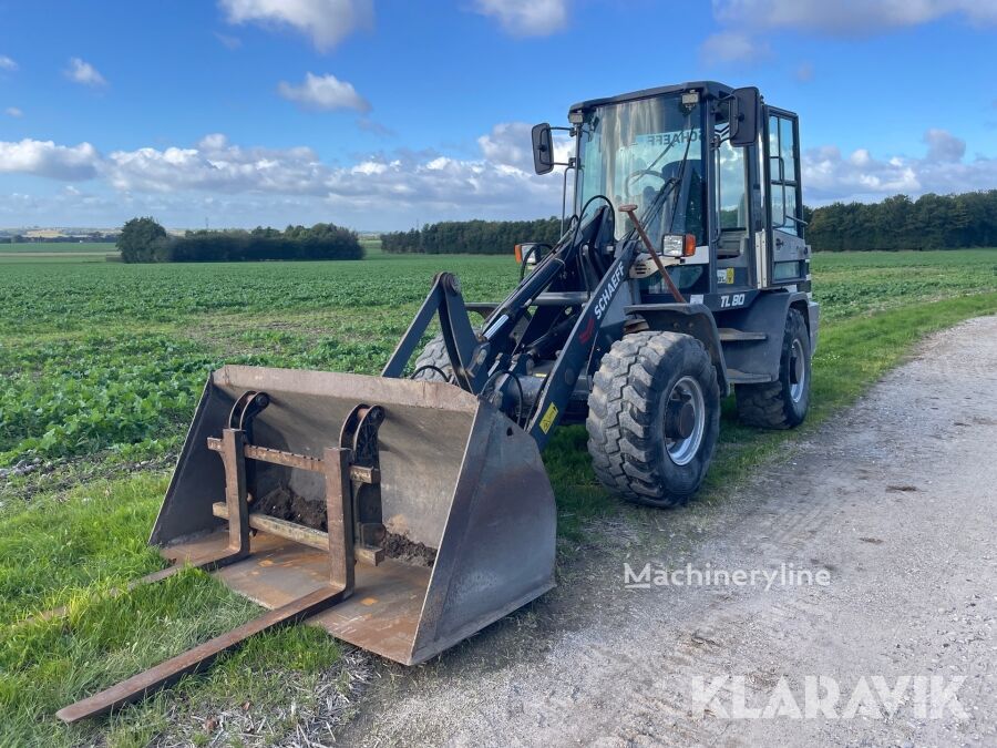 Prodaje se Schaeff TL80 bager-utovarivač na aukciji