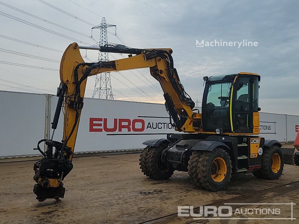 Prodaje se JCB HD110WT T4 bager za pretovar na aukciji
