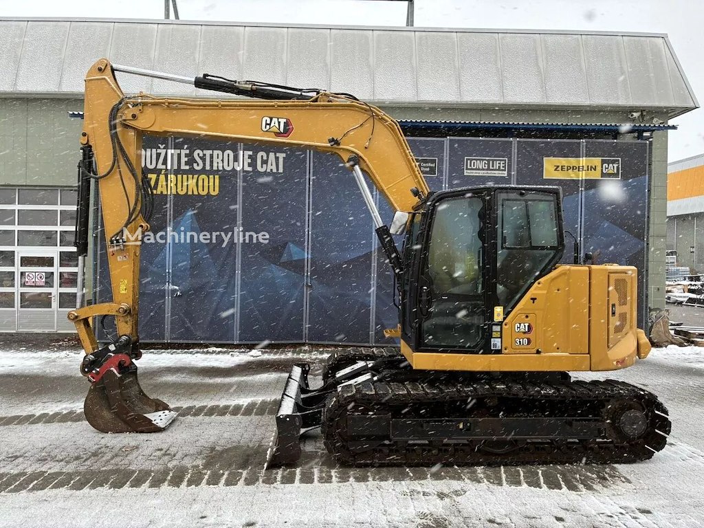 Caterpillar 310 midi bager