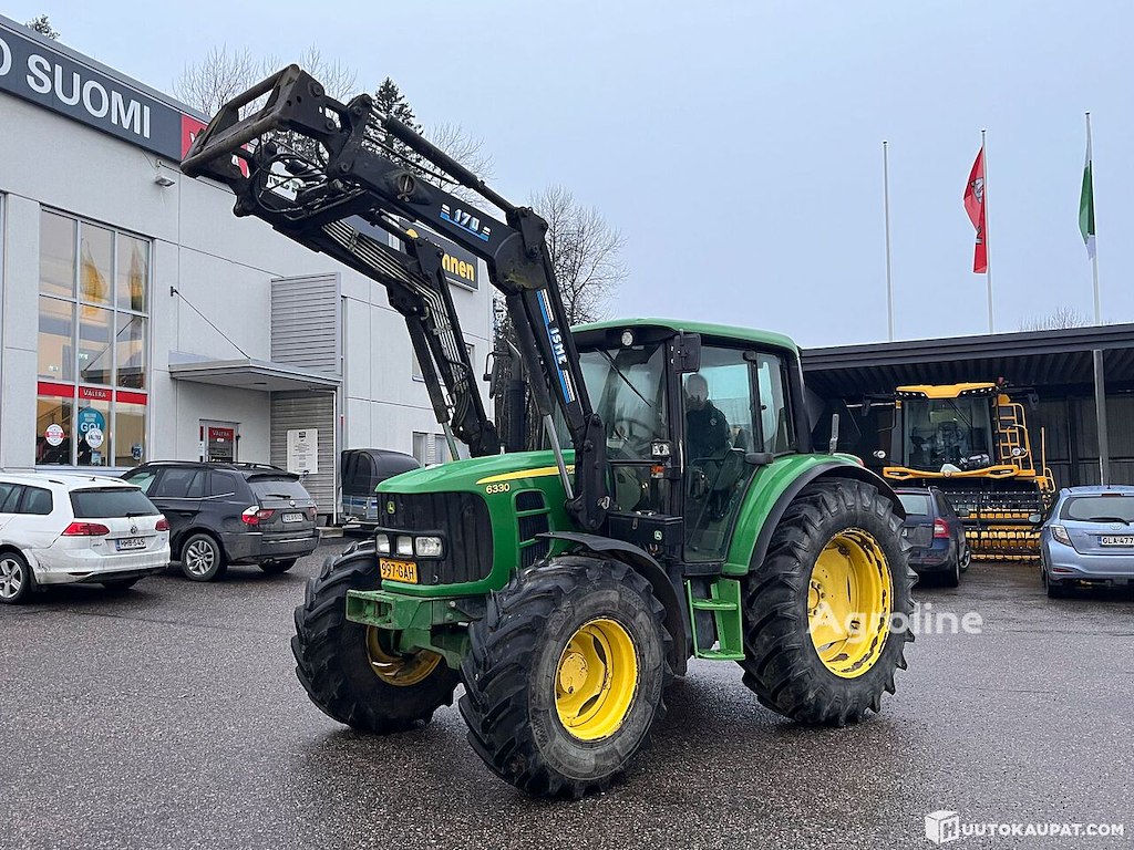 Prodaje se John Deere 6330 tractor with loader, 2012, Espoo traktor točkaš na aukciji
