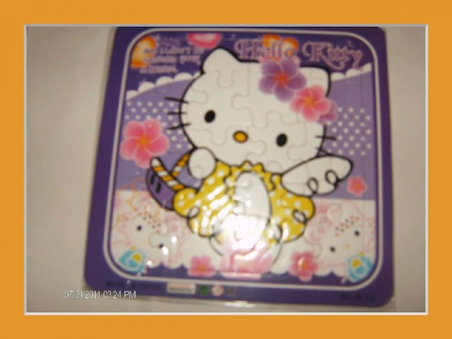 NOVO-PRELEPA SLAGALICA-PUZLE-20 KOM-HELLO KITTY 1