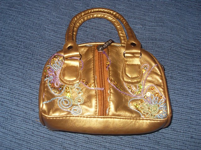 Zlatna torbica za devojcice