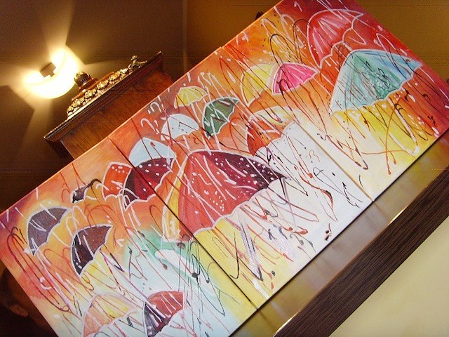 Veseli kišobrani - slika iz tri dela