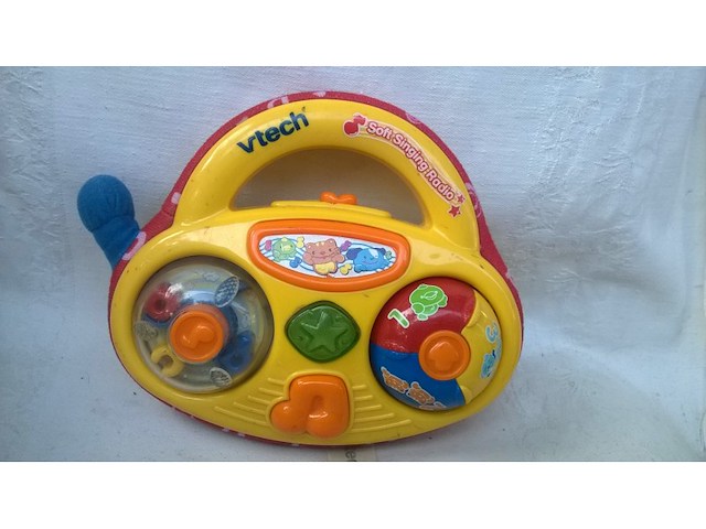 Igracka plasticni muzIcki `radio`15 cm. na baterije 2 x