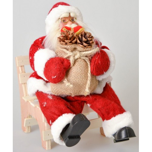 Crveni deda Mraz na stolici 30 cm