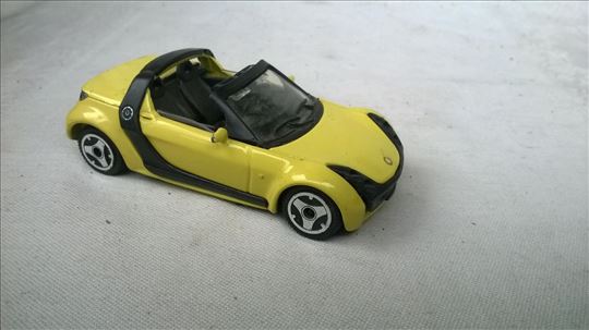 Burago Smart cabrio žuti 1:43, China, očuvan
