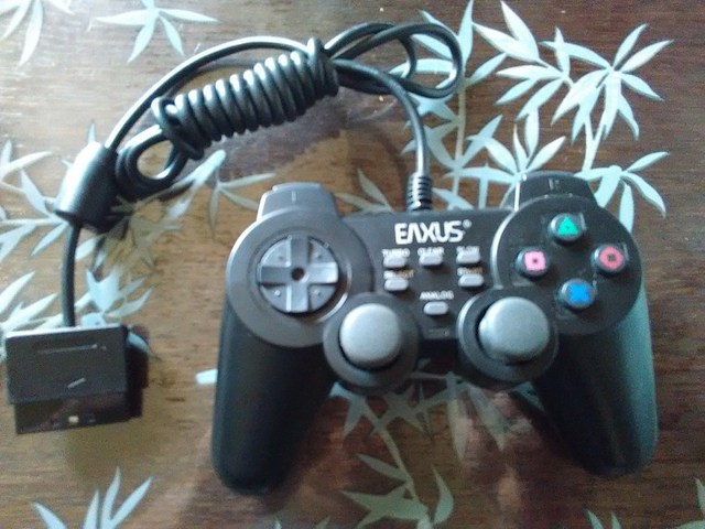 playstation 2 .1djojstik ispravan u stanju sa slika