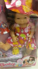 Lutka u šarenoj haljini set igračka