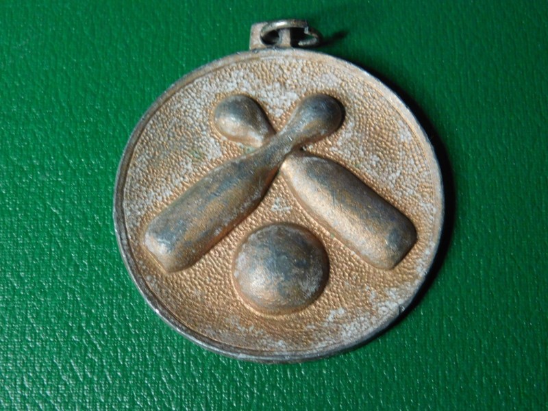 Stara kuglaska medalja.