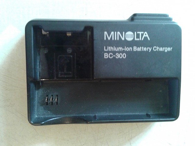 minolta punjac baterija bc-300 ispravan kao sa slika