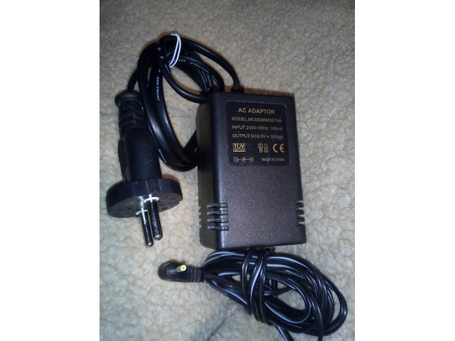 AC-DC Adapter 6,9V 550mA model:MCDD069055TH6