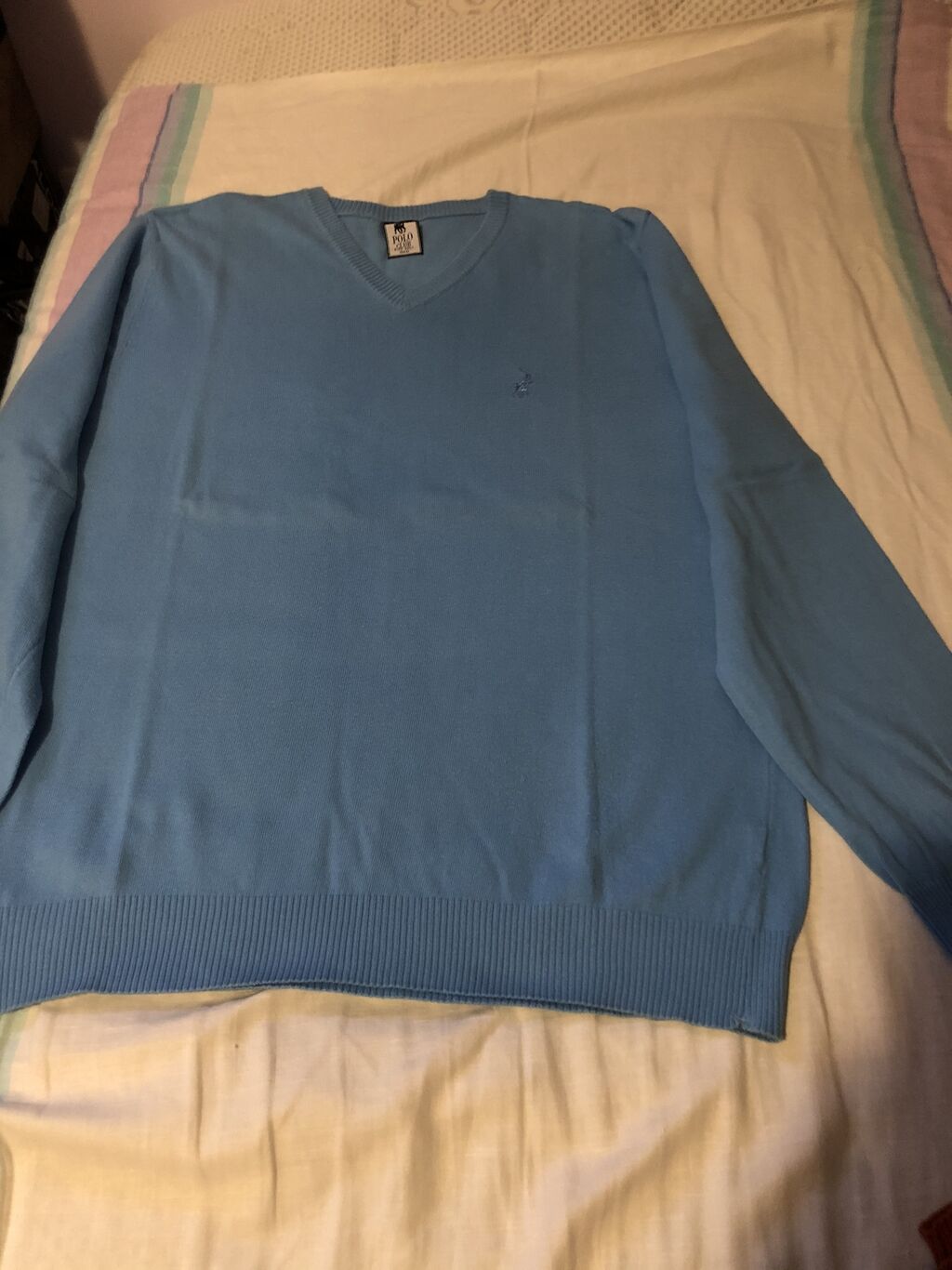 Svetlo plavi Polo džemper, na nekim slikama nije dobro ispala boja