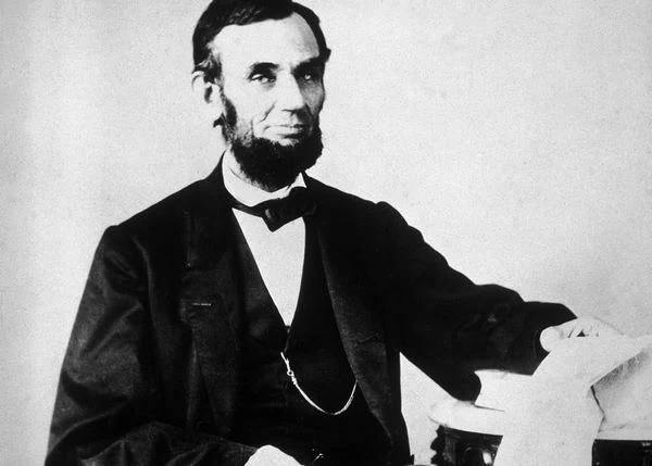 Abraham Lincoln za stolom