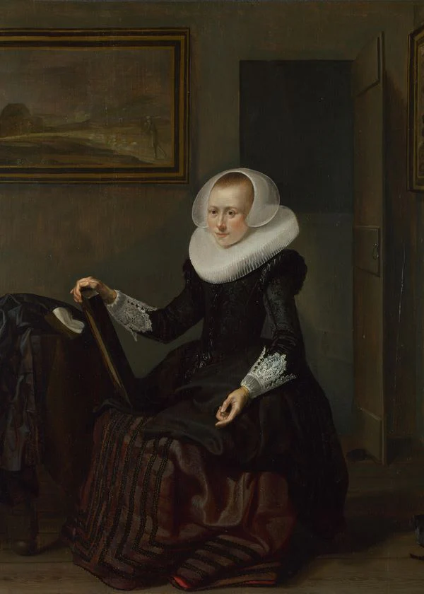 Pieter Codde A Woman holding a Mirror