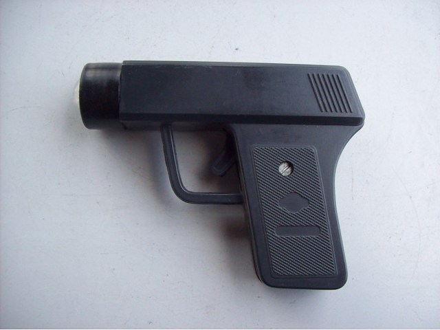 Stari ex-YU plasticni pistolj na bateriju sa sijalicom