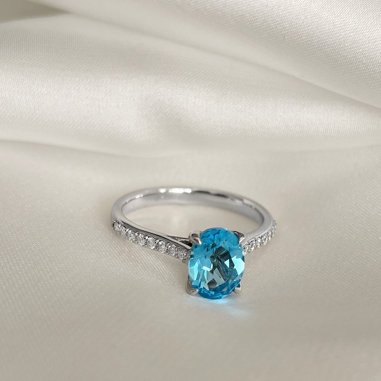 Verenički prsten, belo zlato sa plavim topazom 1.4 ct i dijamantima 0.16 ct Vs-G