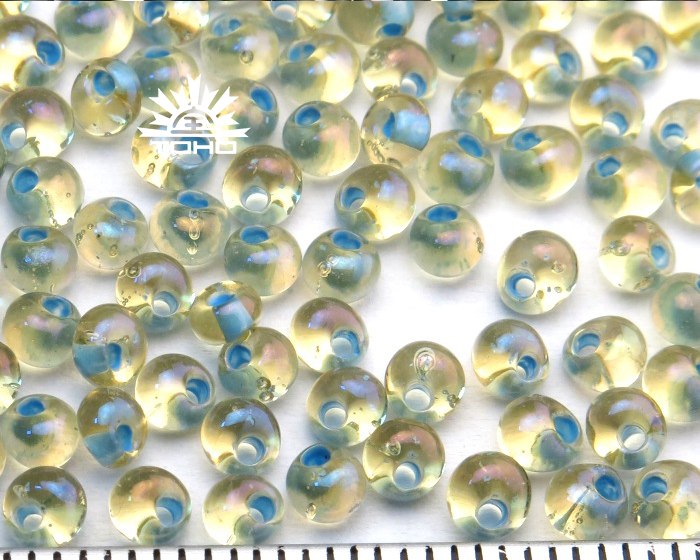 TM-03-952 Magatama 3mm Rainbow Lt.Topaz Sea Foam Lined (5gr)