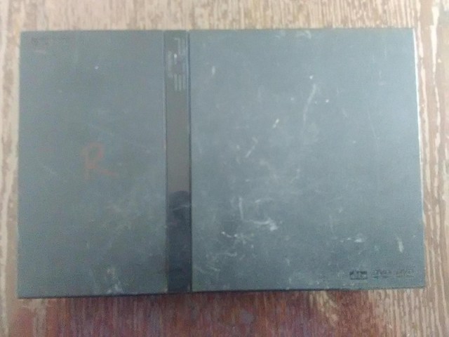 playstation 2 ne cita ko sa slika i u opisu predmeta