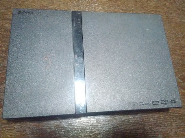 playstation 2 ne cita ko sa slika i u opisu predmeta