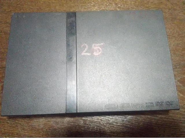 playstation 2 ne cita ko sa slika i u opisu predmeta