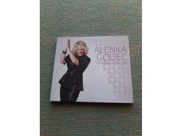 Alenka Godec S kotički ust navzgor