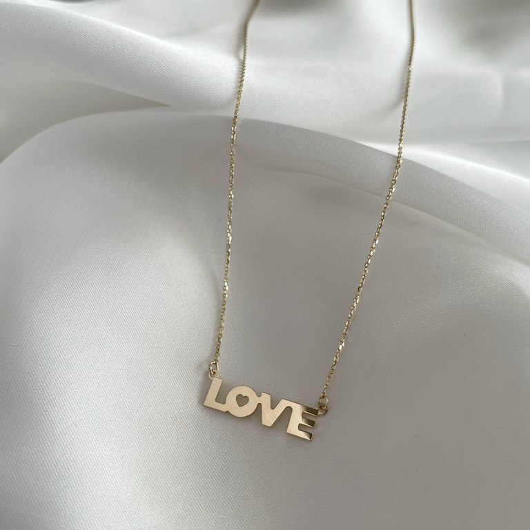 Ogrlica od žutog zlata sa natpisom Love