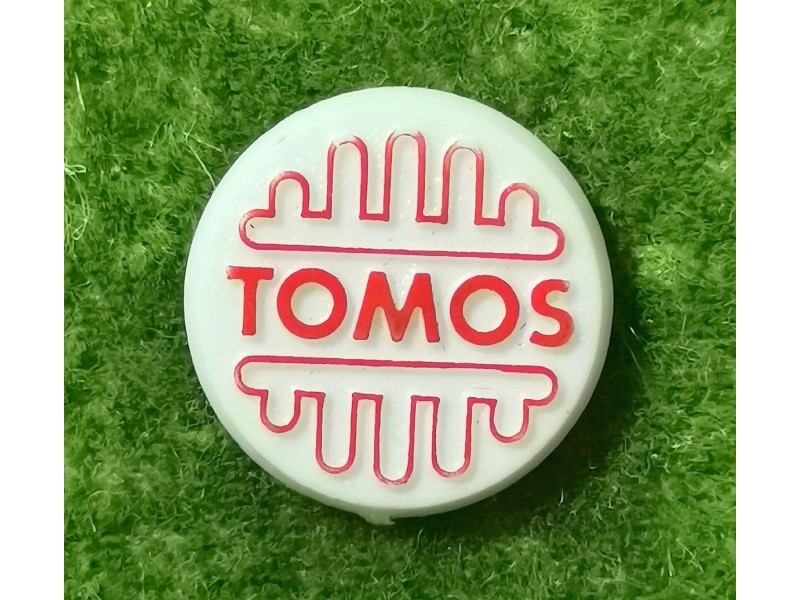 TOMOS.