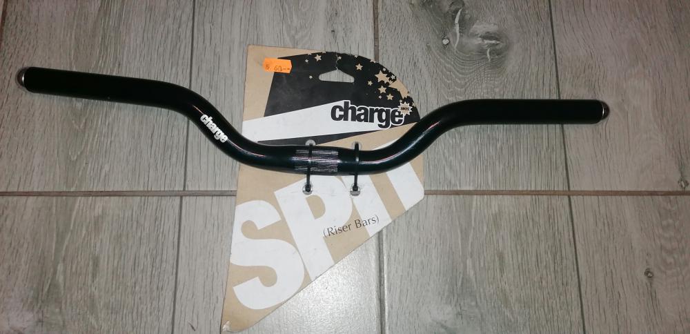 Charge Spit Riser Bar