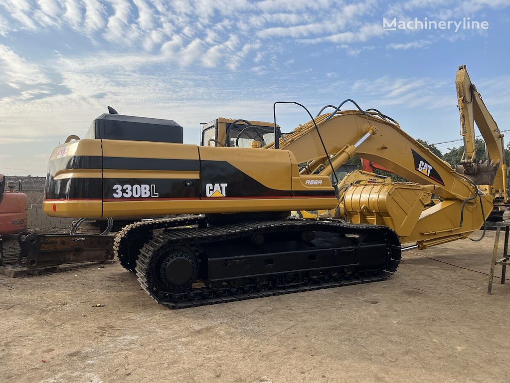 Caterpillar 330BL bager guseničar