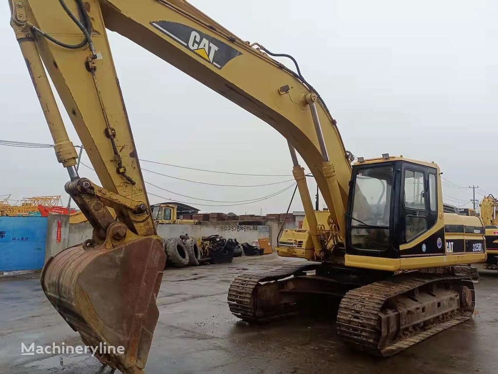 Caterpillar 325BL bager guseničar