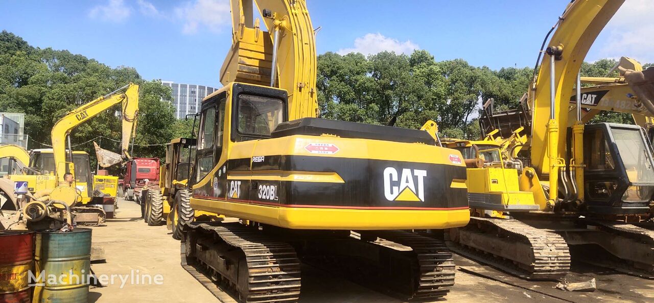 Caterpillar 320BL bager guseničar