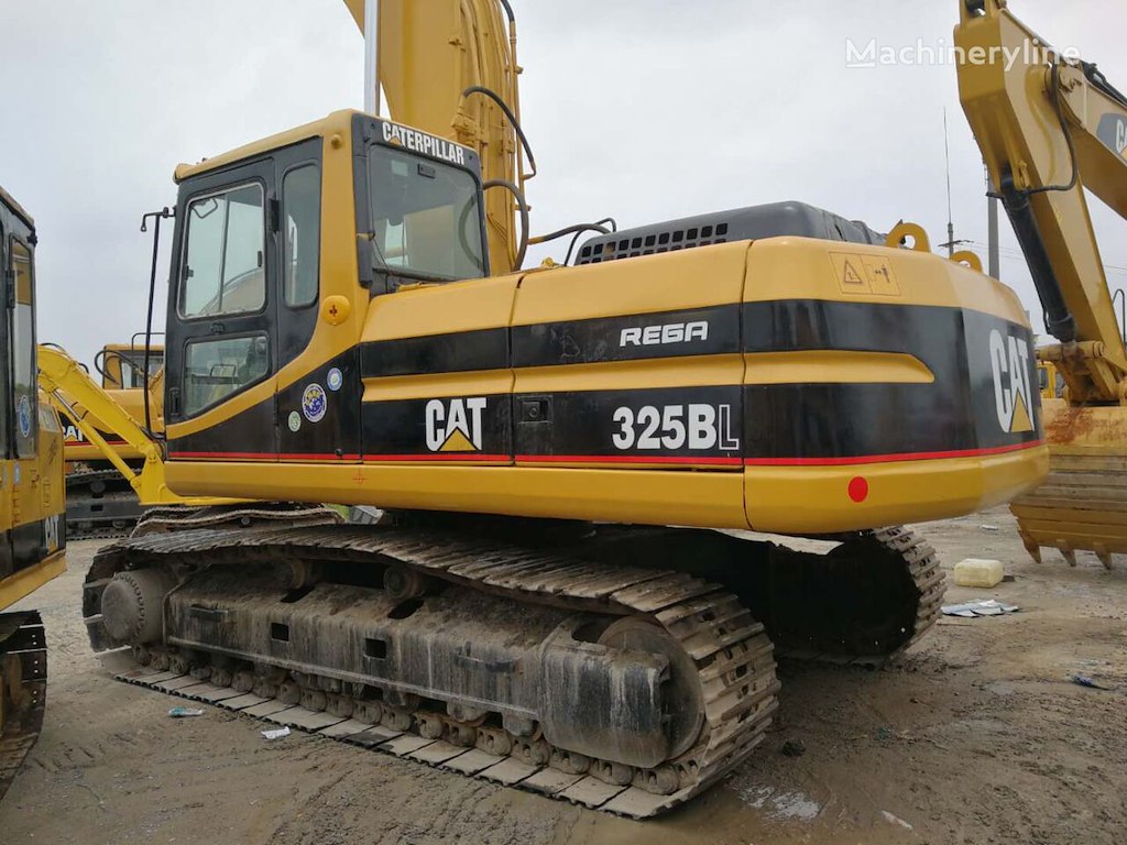 Caterpillar 325BL bager guseničar