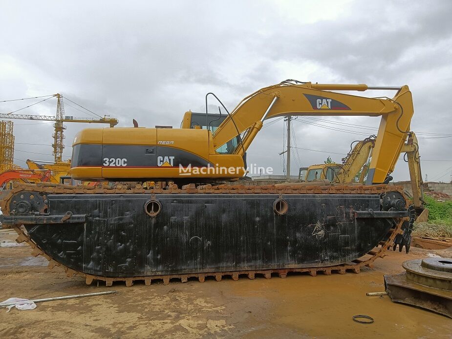 Caterpillar 320C bager amfibija