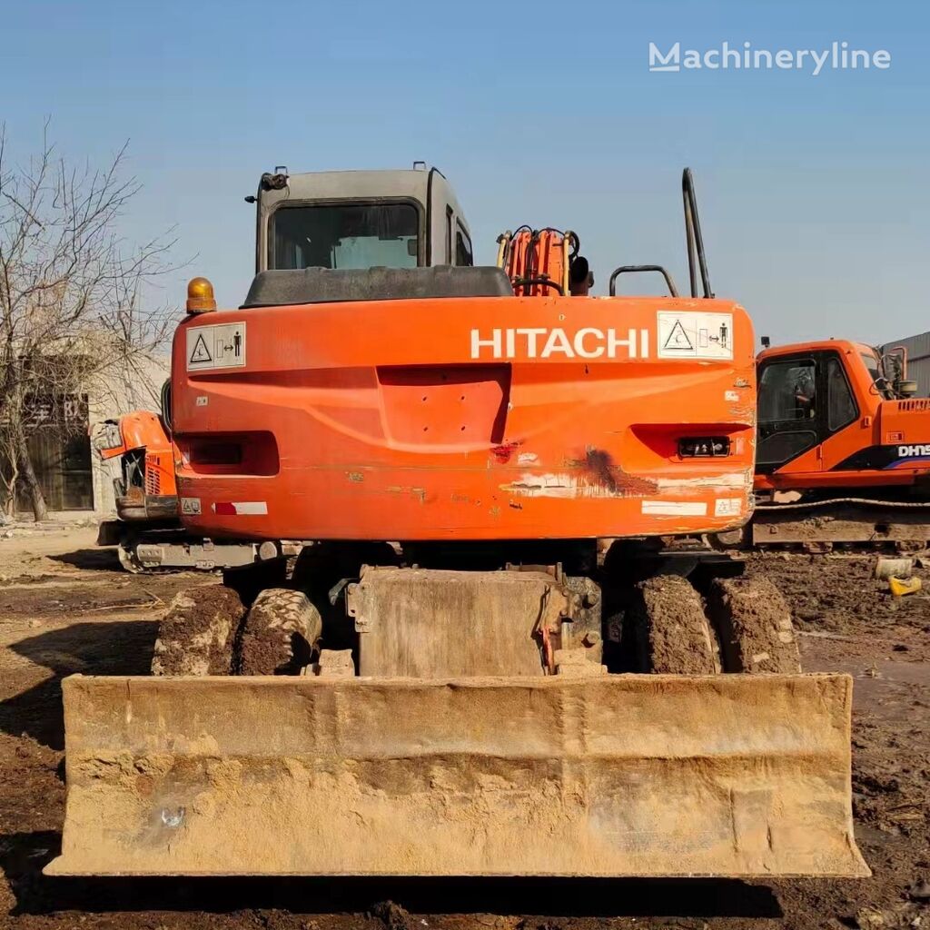 Hitachi EX60W bager točkaš