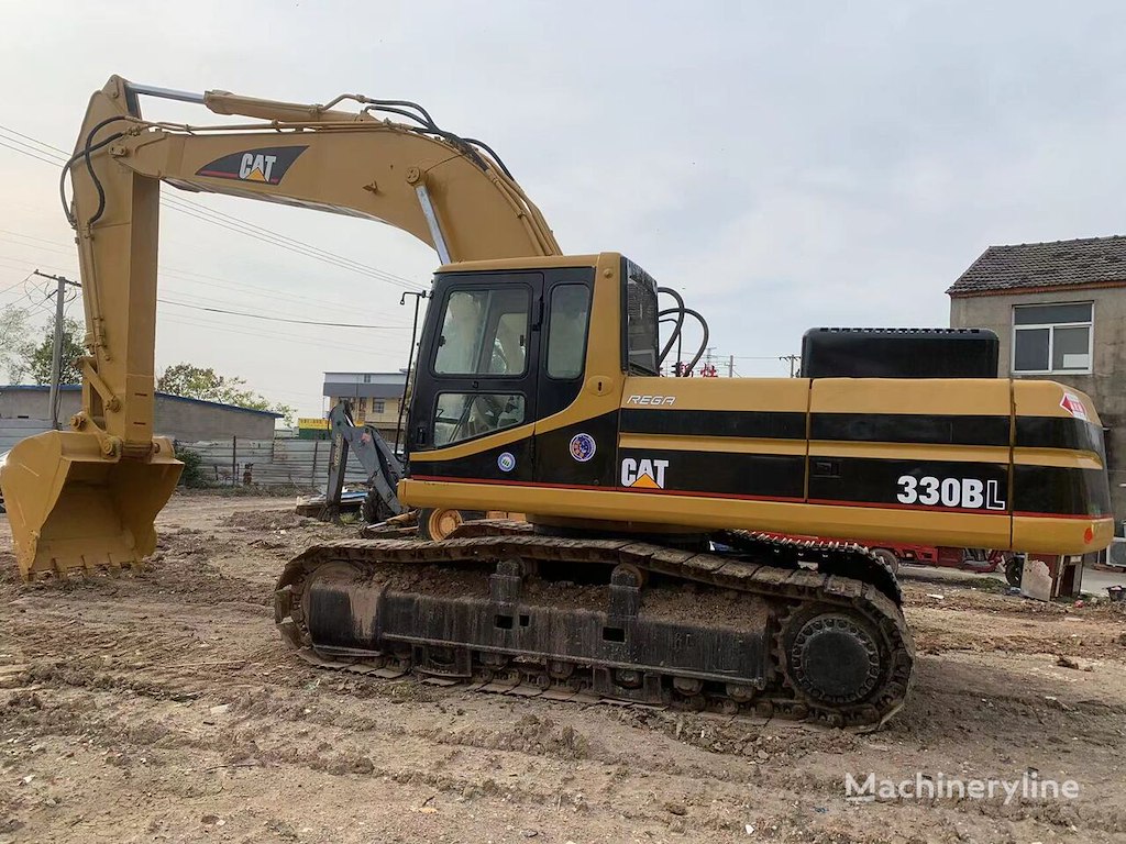 Caterpillar 330BL bager guseničar