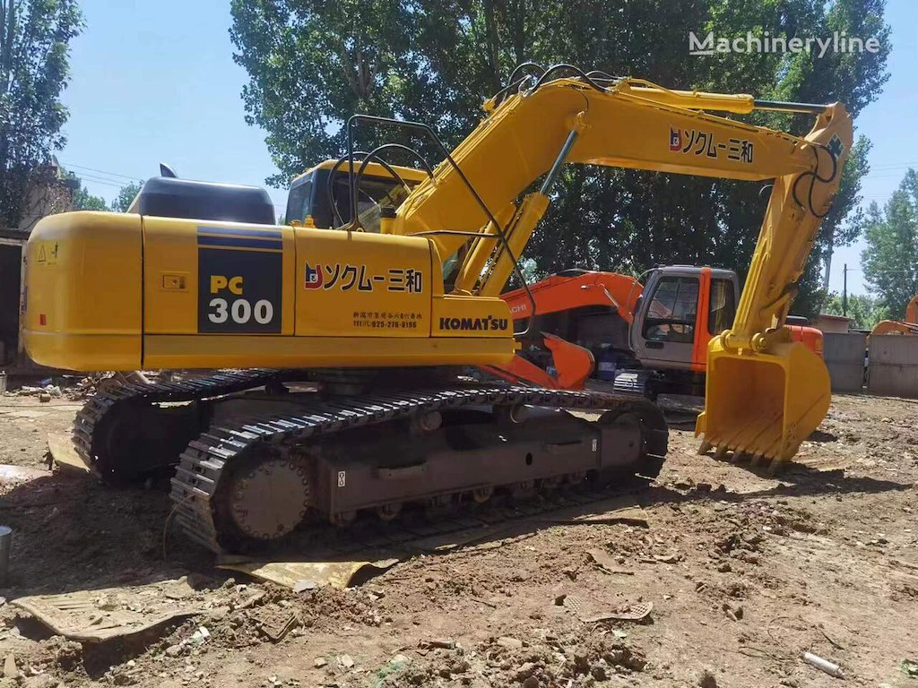 Komatsu PC300-7 bager guseničar