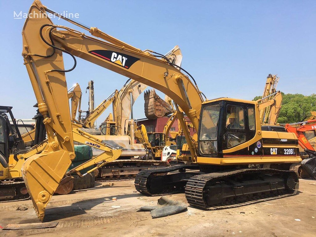 Caterpillar 320BL bager guseničar