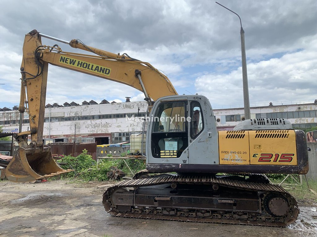 New Holland E215 bager guseničar