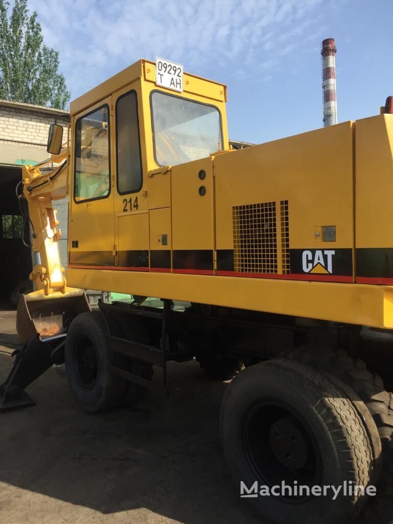 Caterpillar 214 bager točkaš