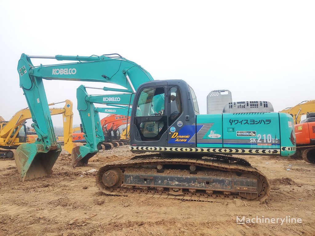 Kobelco SK210 bager guseničar