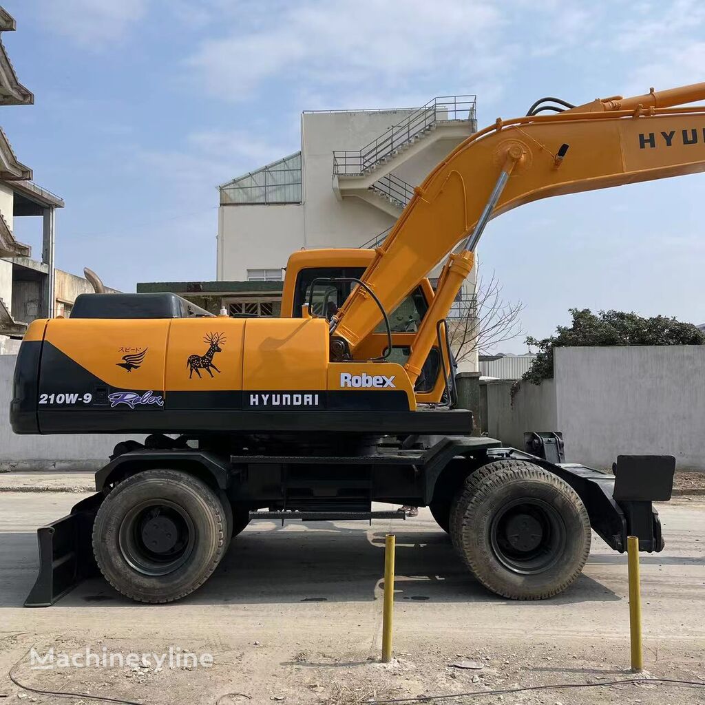 Hyundai R210 bager točkaš