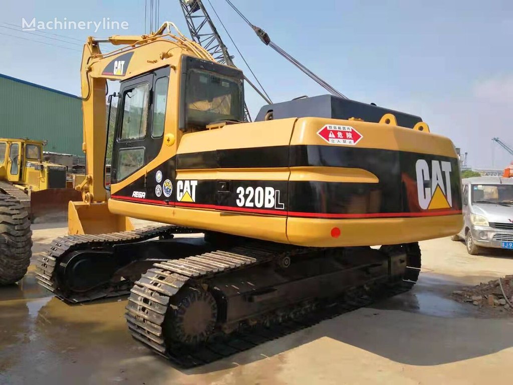 Caterpillar 320BL bager guseničar